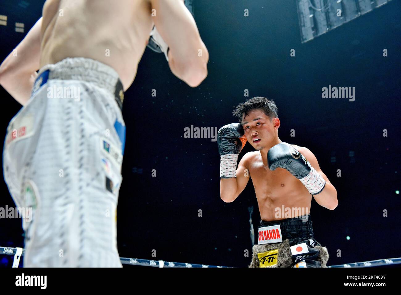 WBC light flyweight champion Kenshiro Teraji (white trunks) and WBA super champion Hiroto ...
