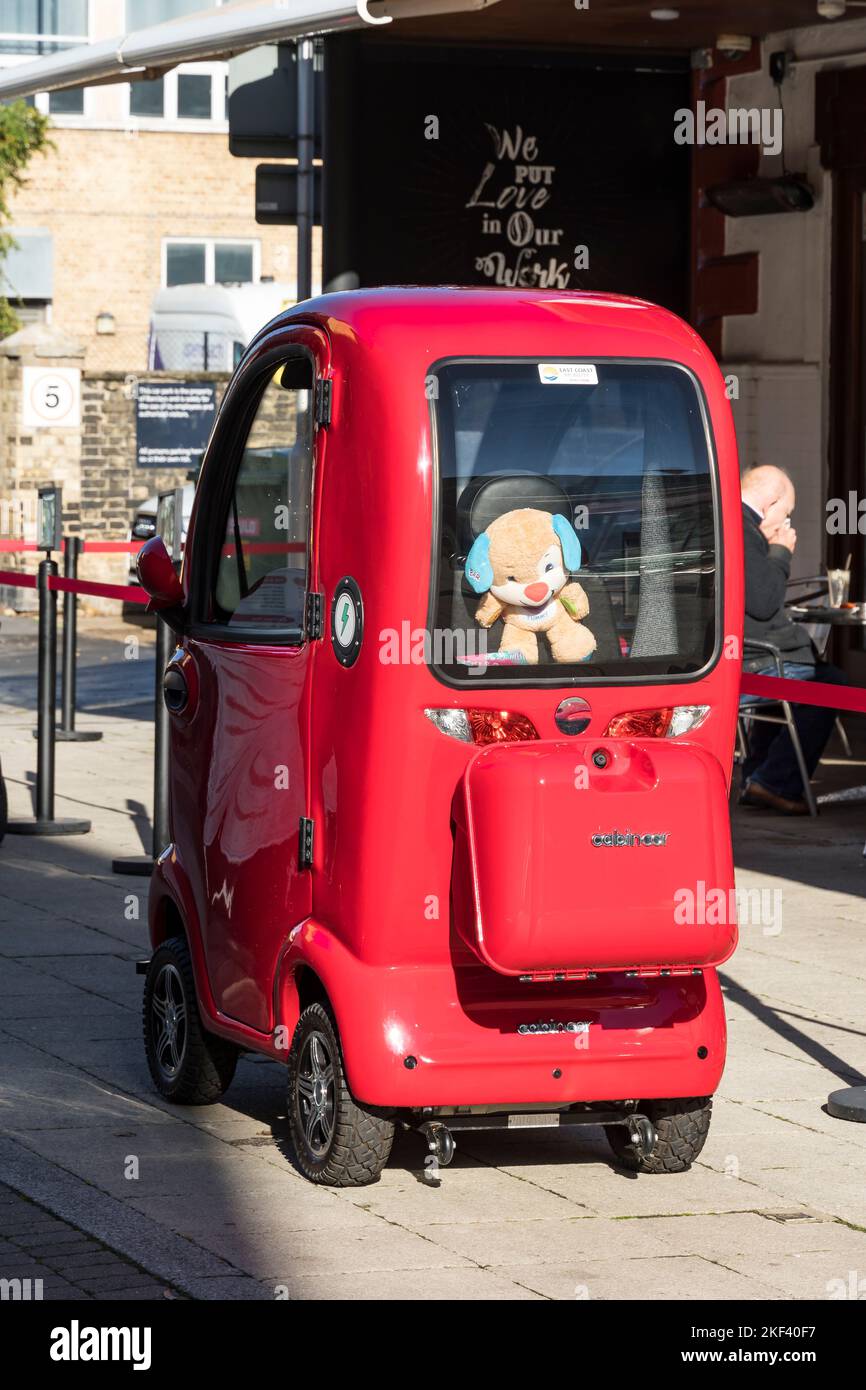 Teddy bear in back of cabincar mobility scooter london road north ...