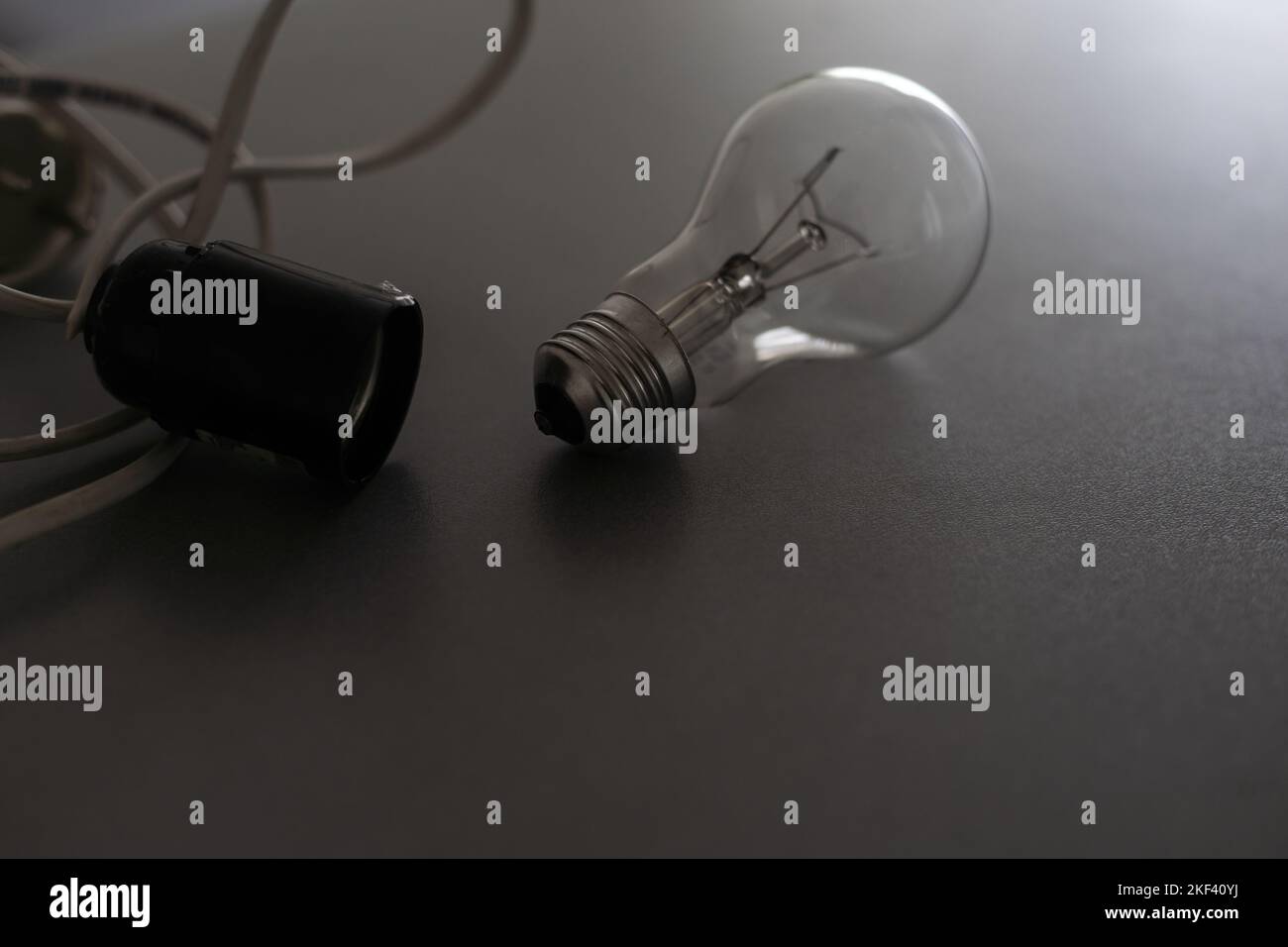 Lamp socket in black color for lamp bulb lamp on gray background, lamp ...