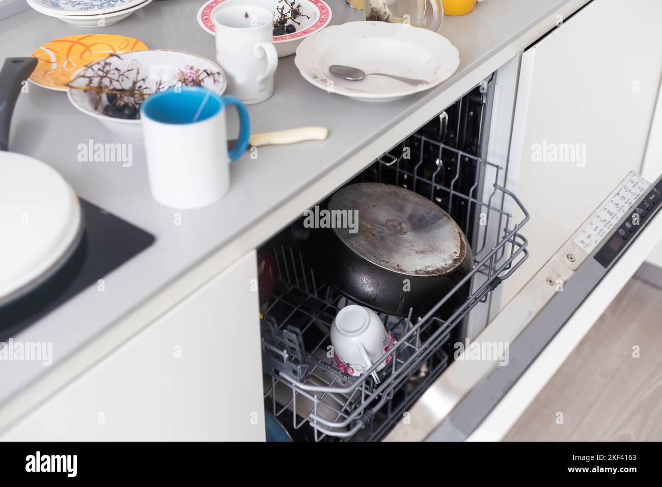 Pile of dirty dishes in the kitchen Stock Photo - Alamy