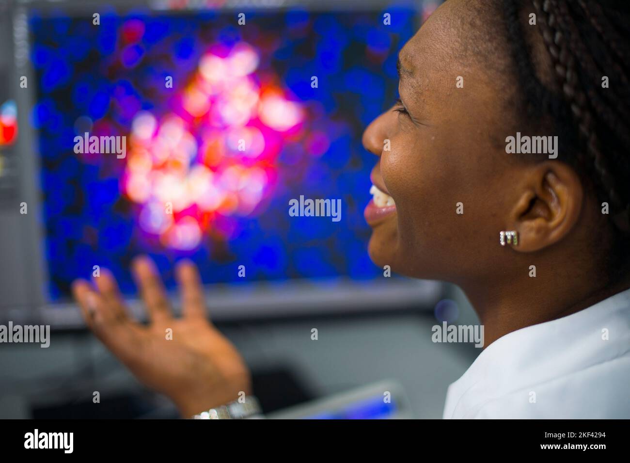 A university student using a microscope Stock Photo - Alamy