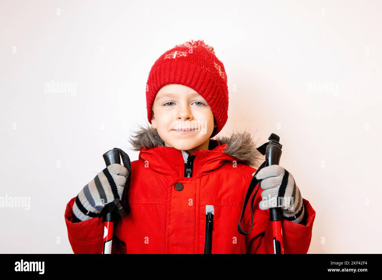 Boy in red snow jacket hi-res stock photography and images - Alamy
