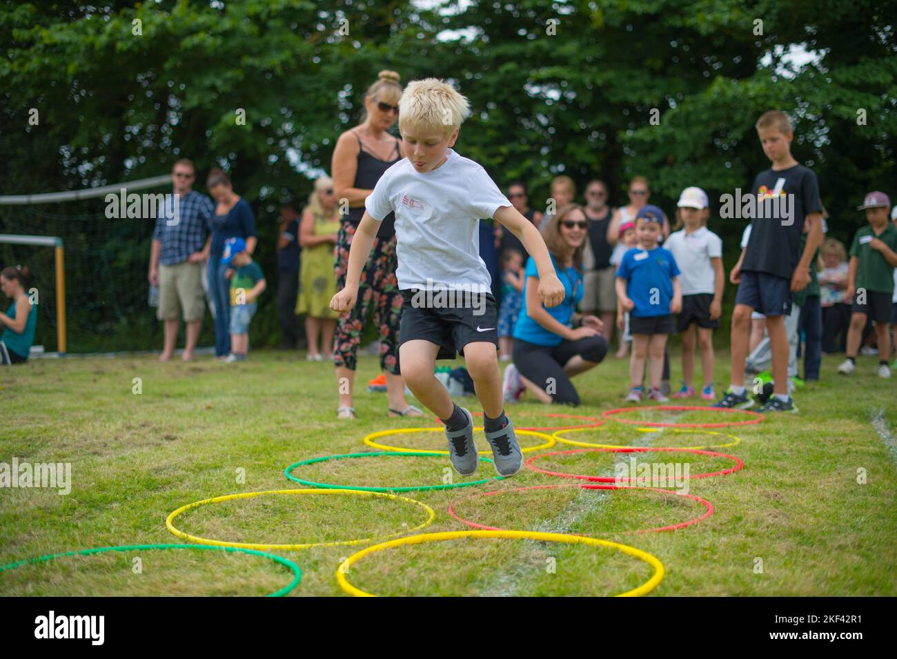 A young boy competing at a primary school sports day Stock Photo - Alamy