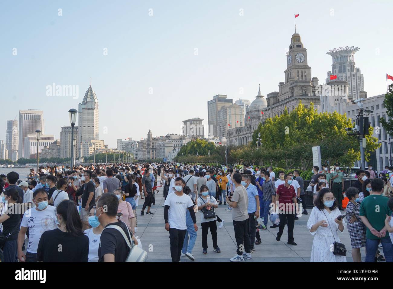 Traffic policemen built up a "zippered human wall" to disperse the ...