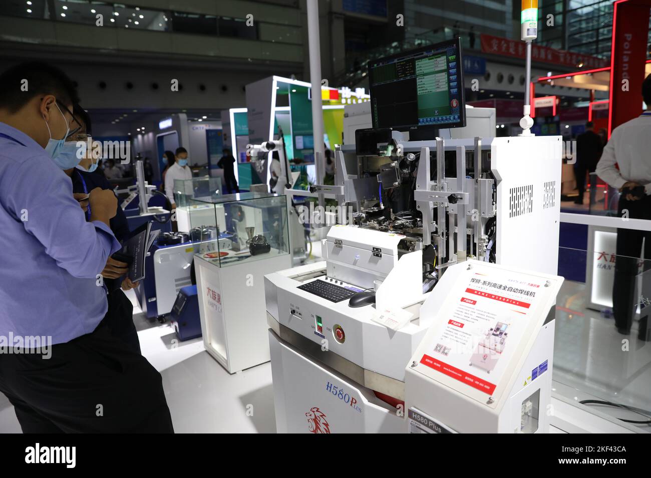 Photo shows automatic wire bonder mady by Han's Laser at the 24th China Hi-Tech Fair (CHTF ...