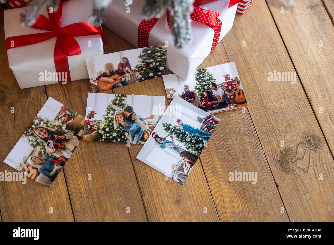 photos next to Christmas gift boxes Stock Photo - Alamy