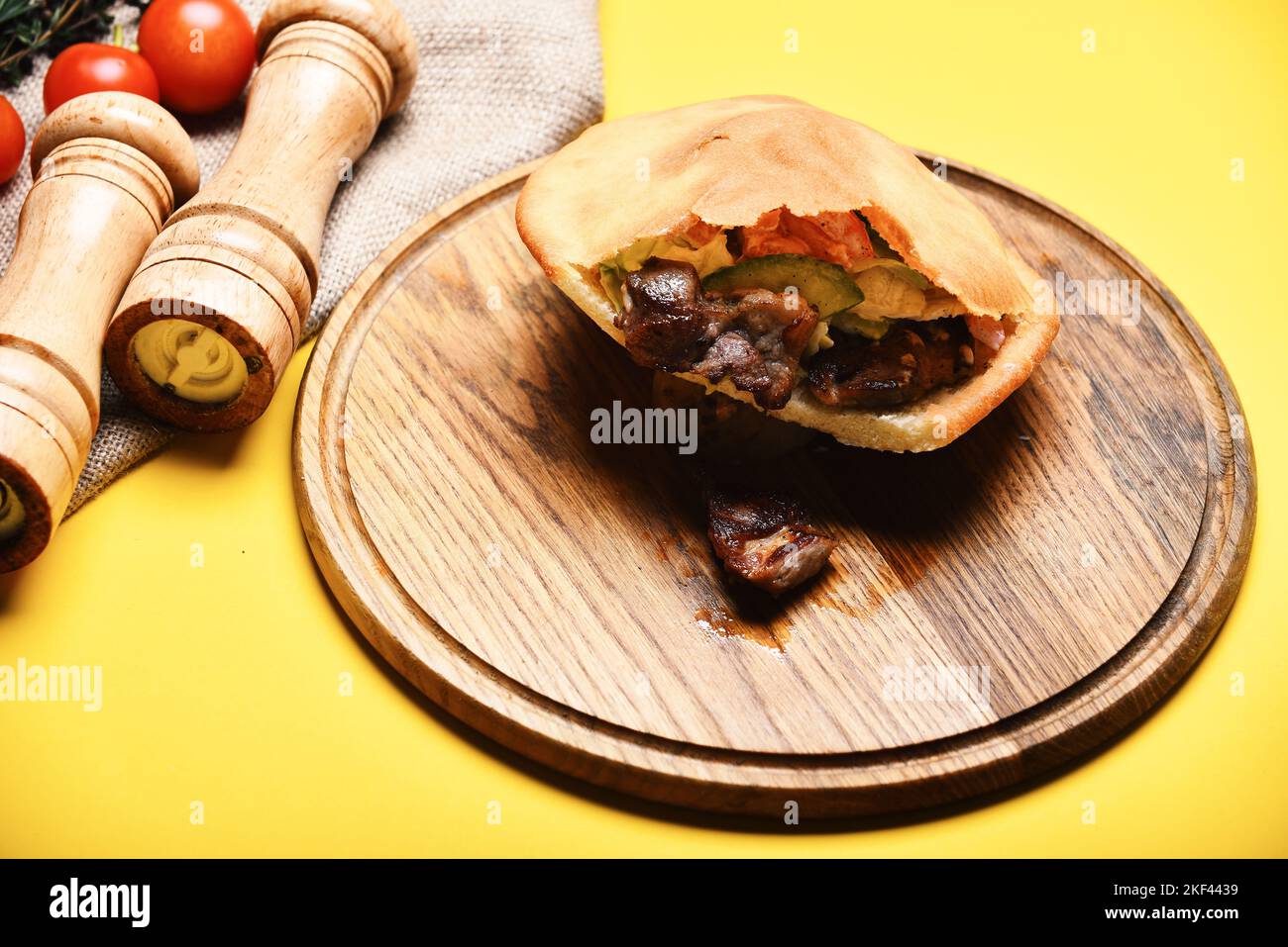 Traditional rustic cuisine concept. Closed pizza with meat filling ...