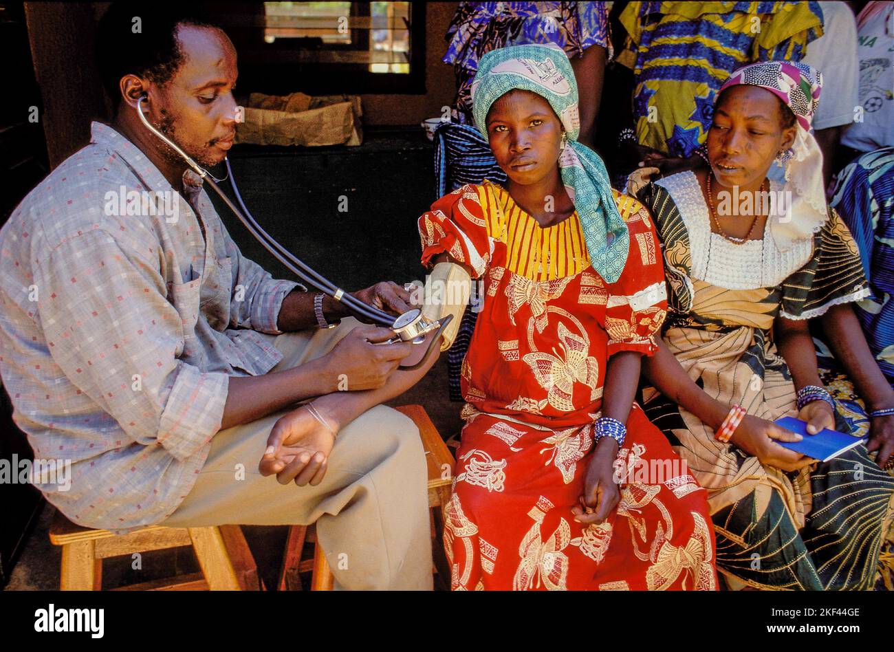 Burkina Faso, Burkina Faso, Piela. A physician is measuring the blood ... Burkina Faso, Burkina Faso, Piela. A physician is measuring the blood ...