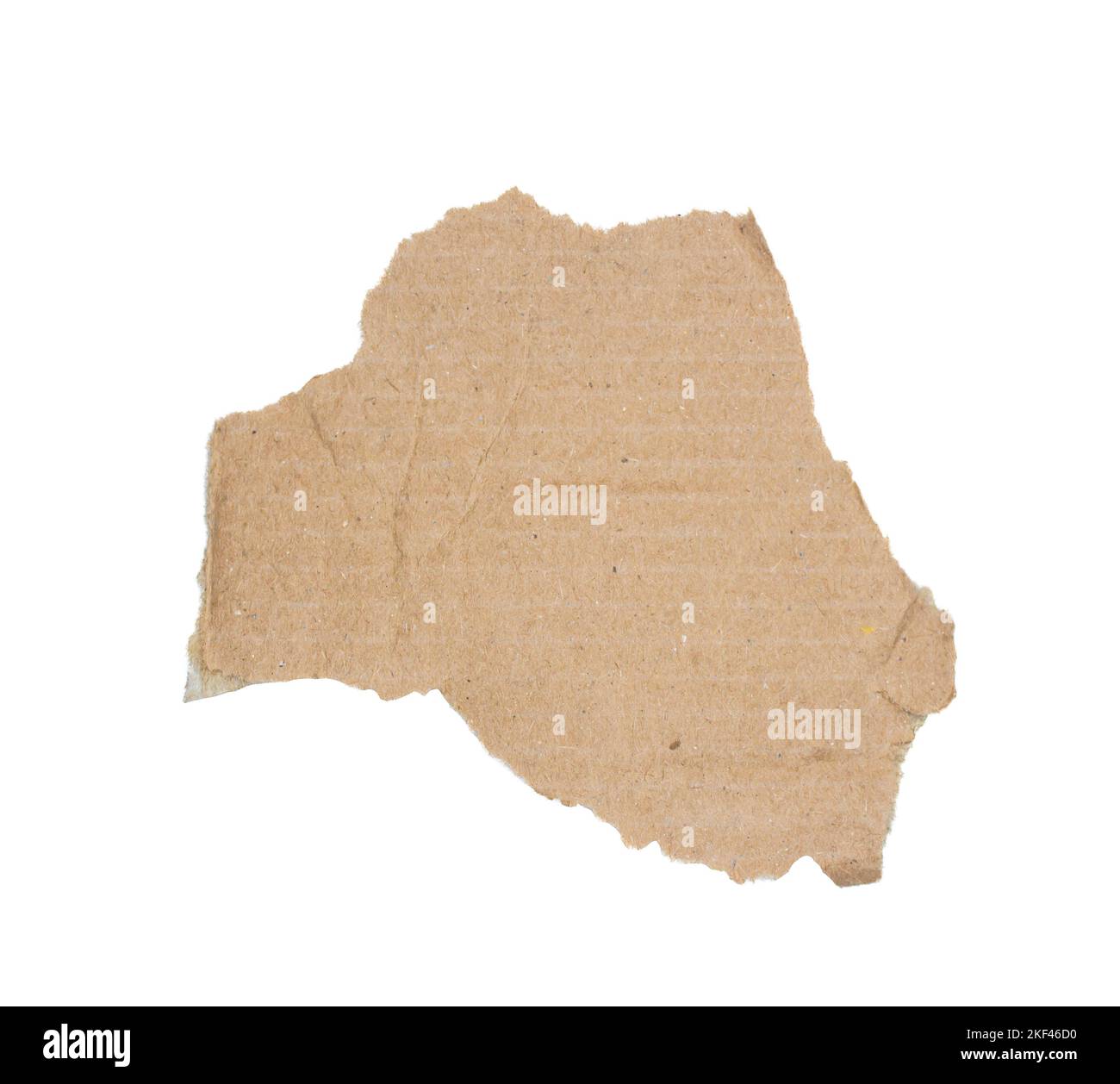Cardboard piece isolated on white background. Top view of torn ...