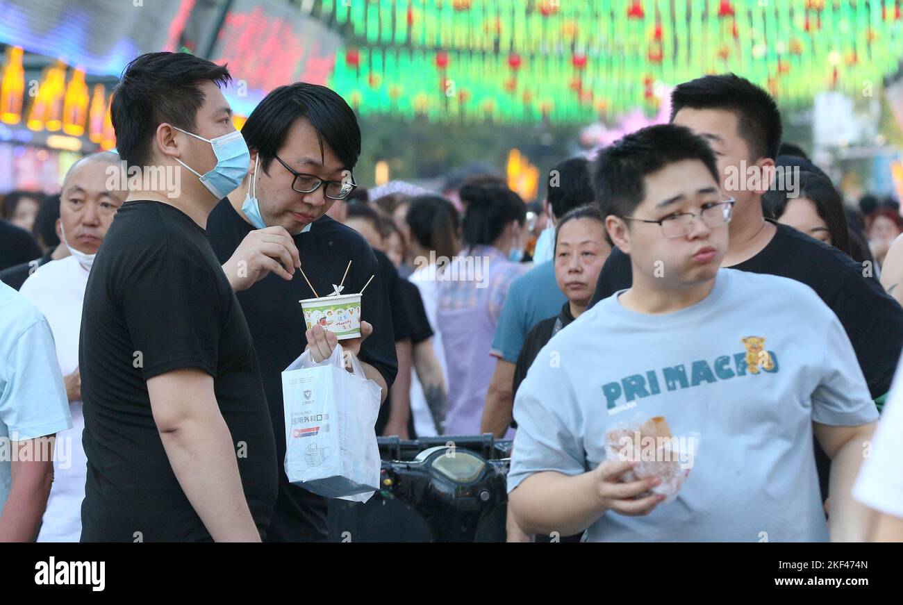 The crowds at the night market near the Harbin Normal University in ...