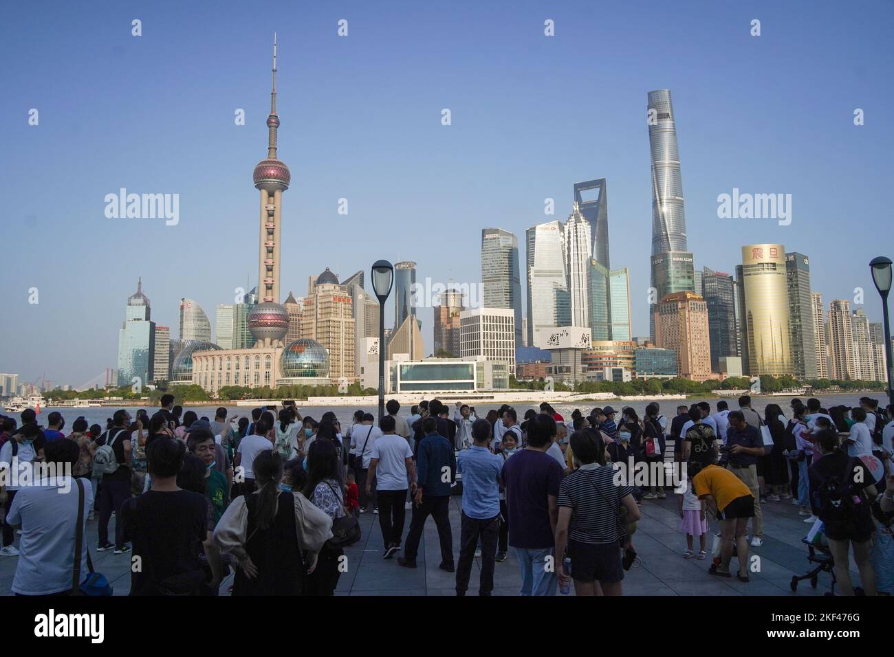 Traffic policemen built up a "zippered human wall" to disperse the ...