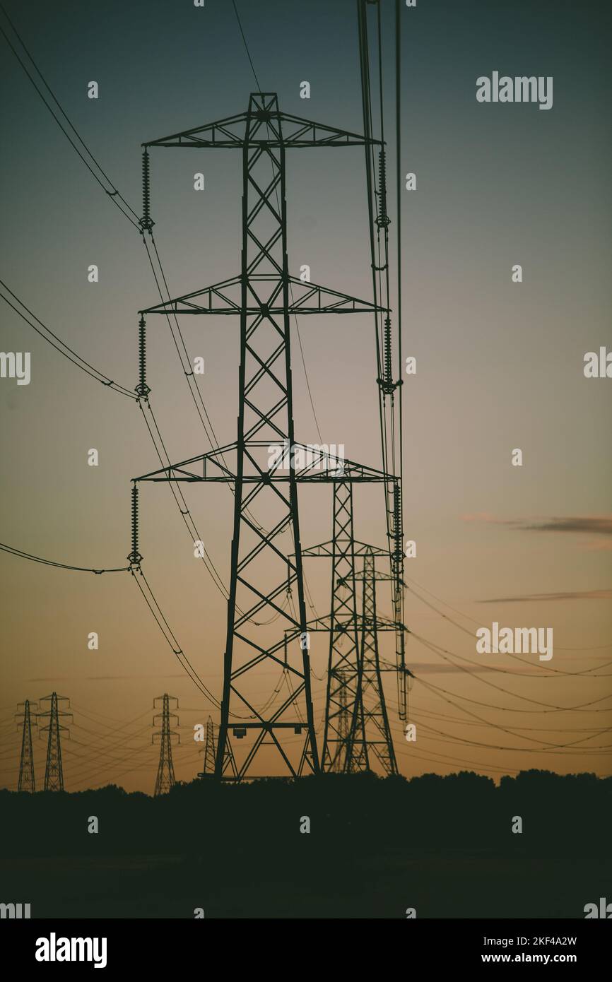 Leading Lines of Electricity Power Tower Masts Stock Photo - Alamy