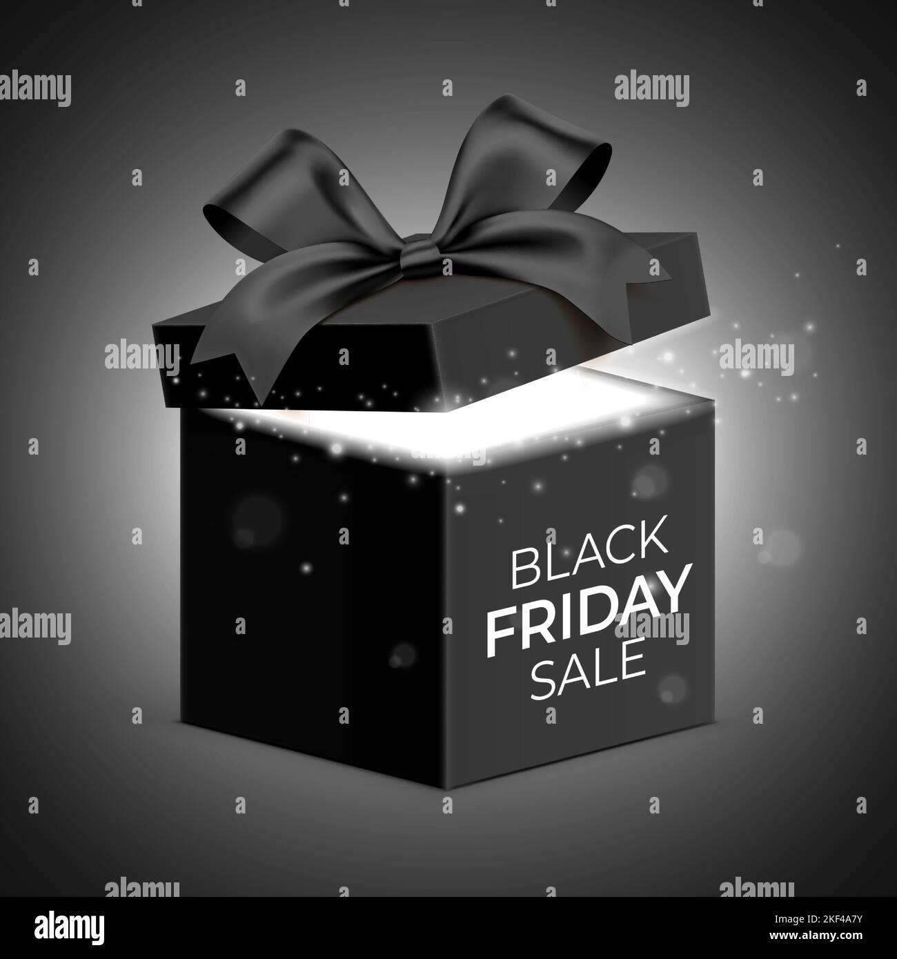Black Friday Sale gift box with ribbon and glitter light shining from ...