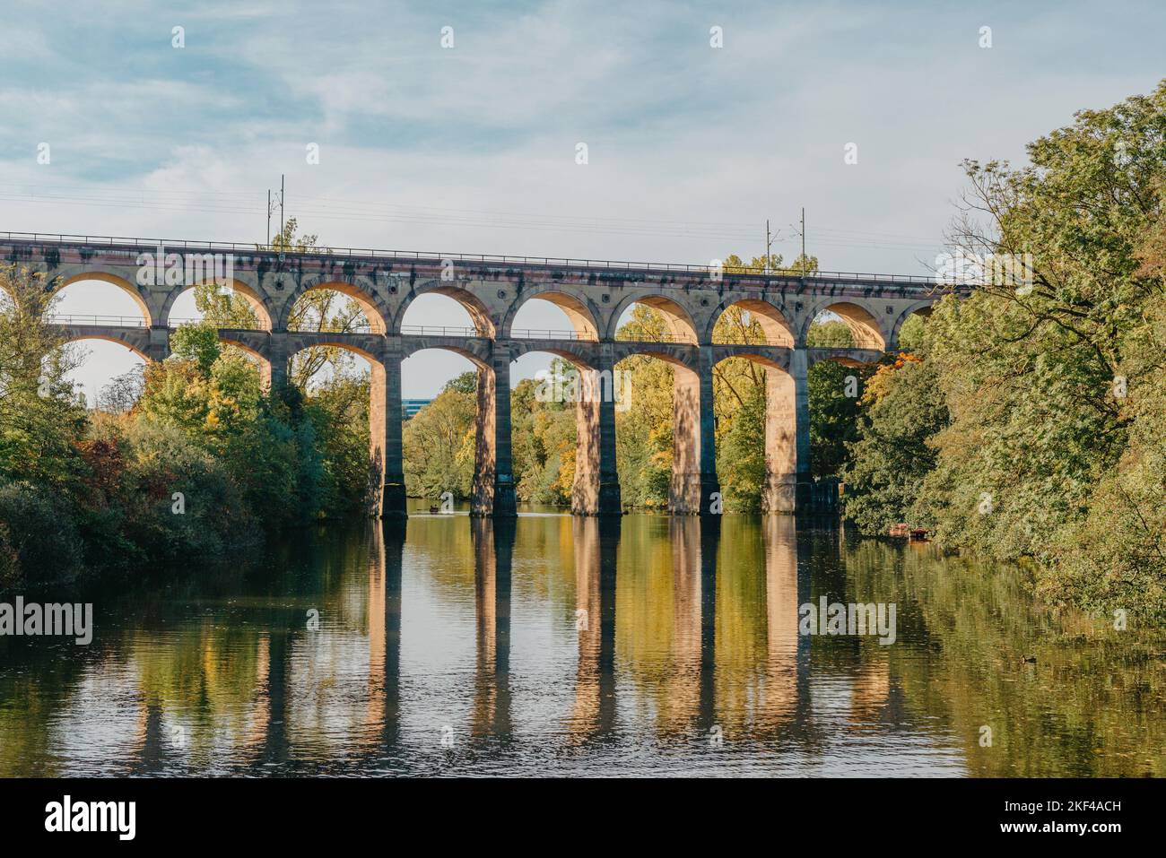 Germany train passing train bridge on cloudy day in germany hi-res ...