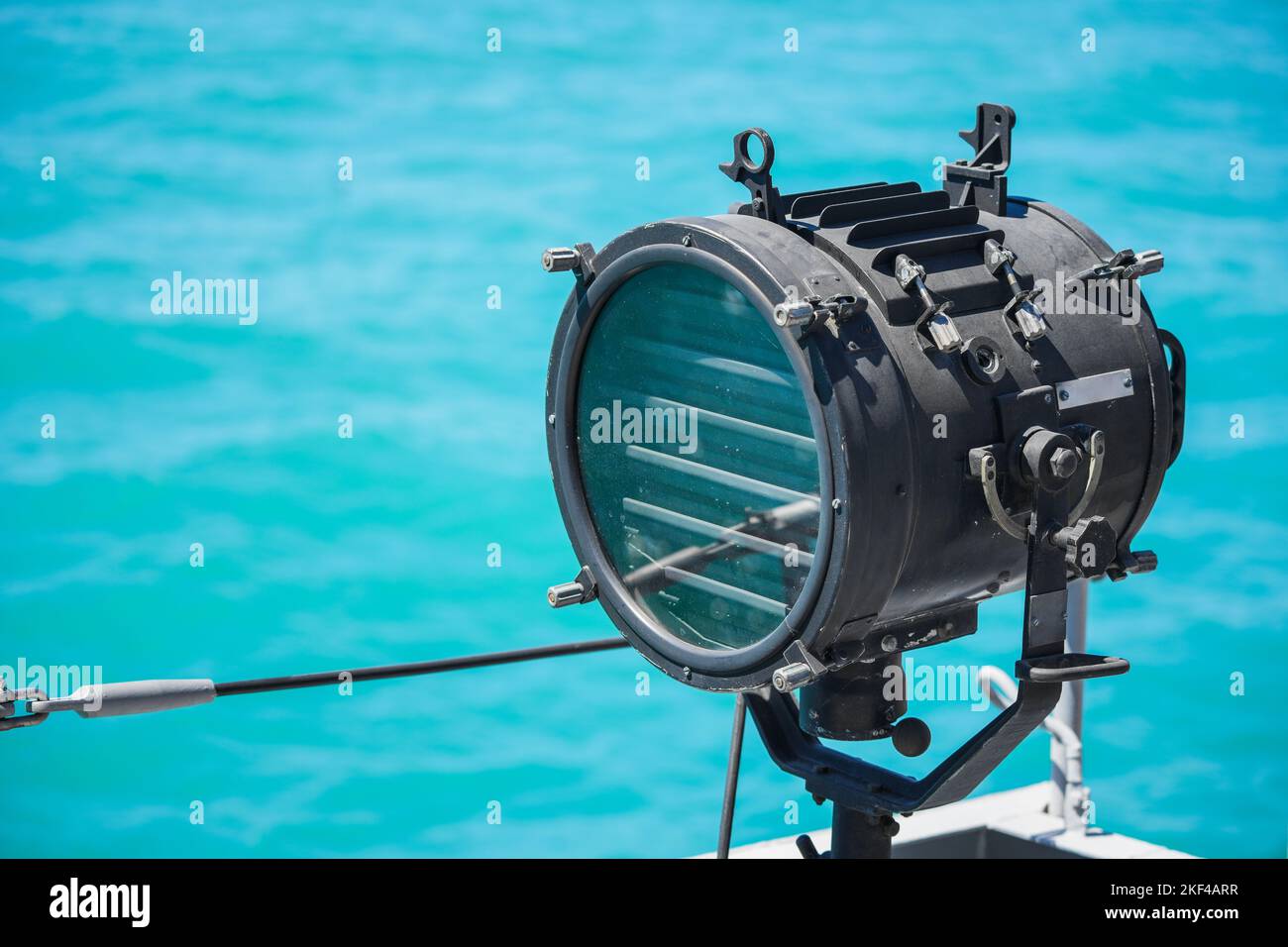 A searchlight or spotlight onboard the navy warship Stock Photo - Alamy