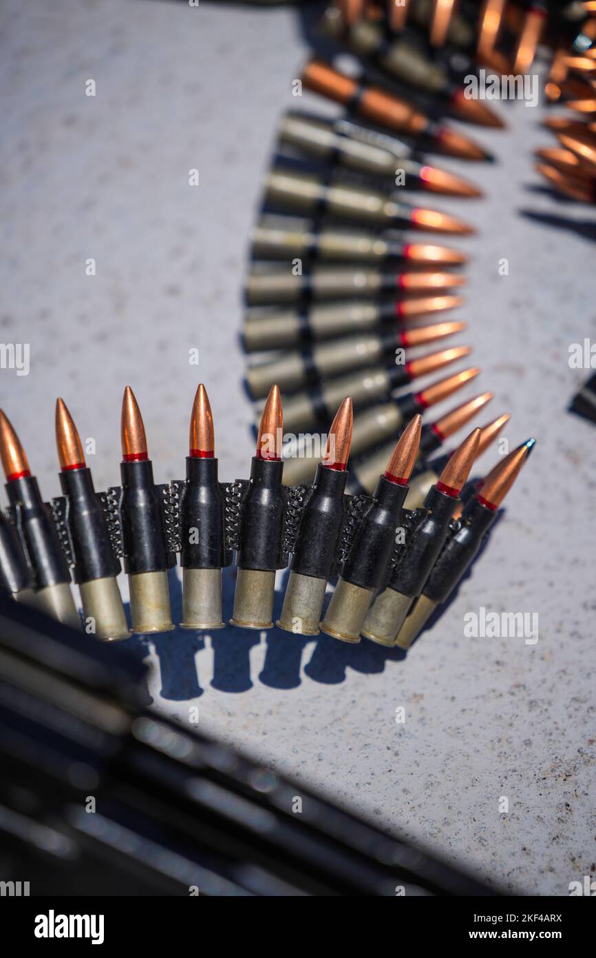 Close up shot of a machine gun belt loaded with cartridges Stock Photo ...