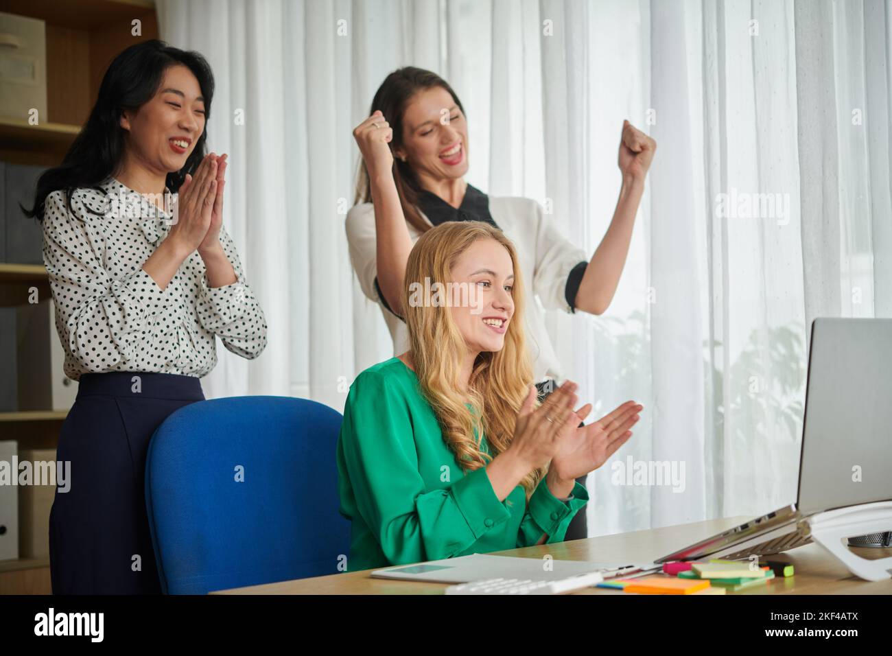 Happy team clapping excited new hi-res stock photography and images - Alamy