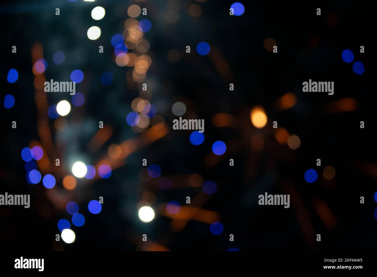 On a black background bokeh from explosions of colorful fireworks Stock ...