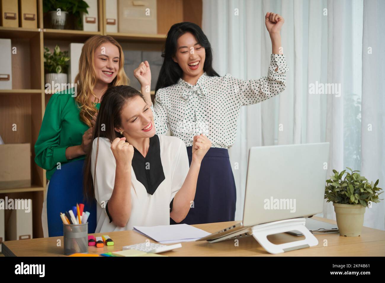Business team celebrating success of their business project Stock Photo ...