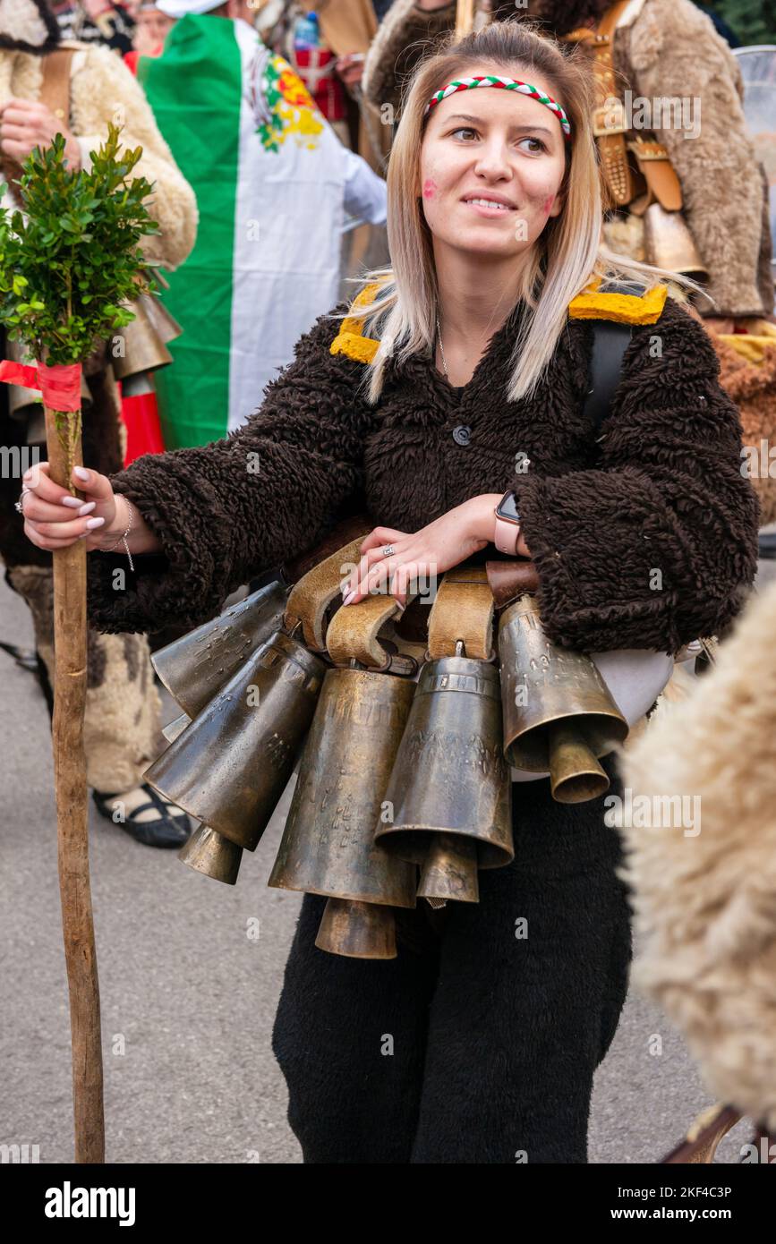 Female Kukeri dancer posing for photo at a traditional annual festival ...