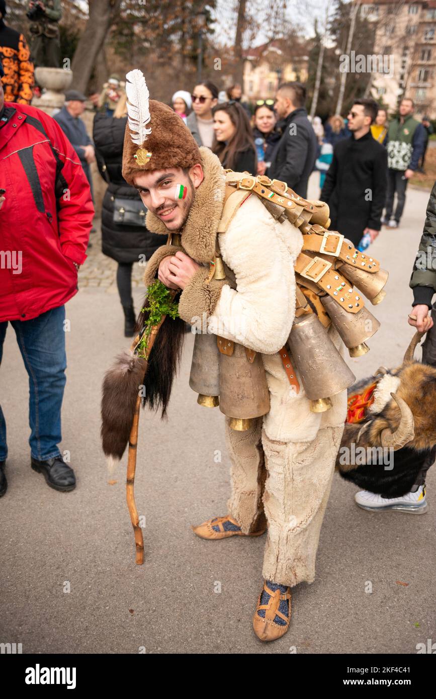 Young Kukeri dancer with intricate costume and large bells at a ...