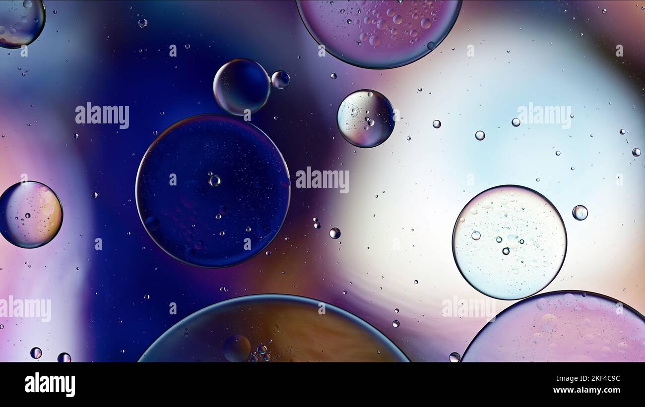 Abstract Colorful Food Oil Drops Bubbles and spheres Flowing on Water ...