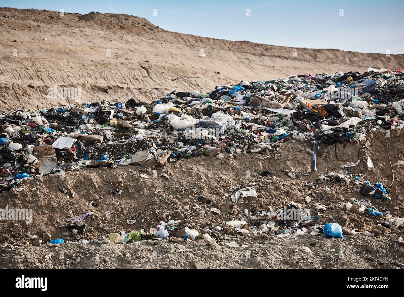 Open air garbage dump. Plastic pollution. Recycling junk. Consumerism ...