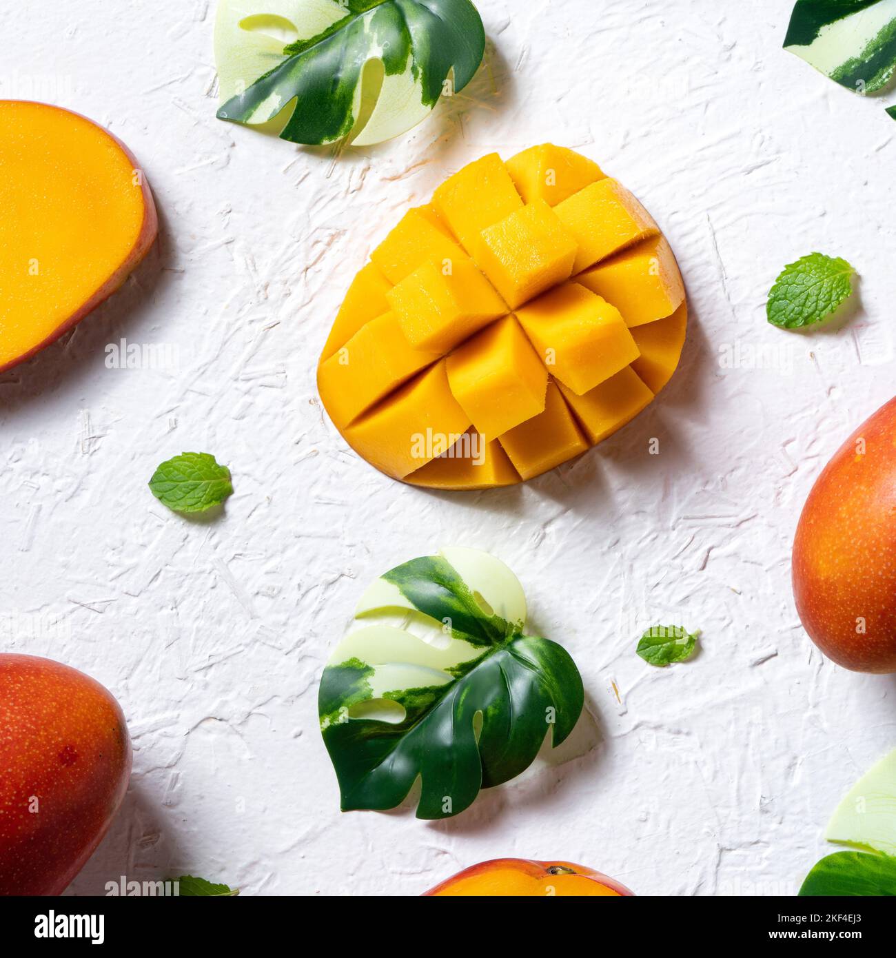 Mango background design concept. Top view of diced fresh mango fruit ...