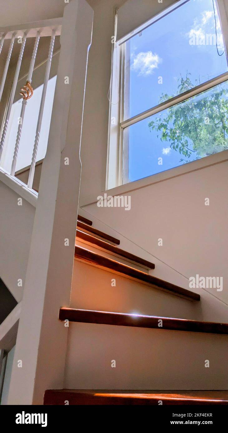 A vertical of the sun seeping through the window on top of the ...