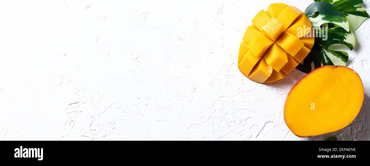 Mango background design concept. Top view of diced fresh mango fruit ...