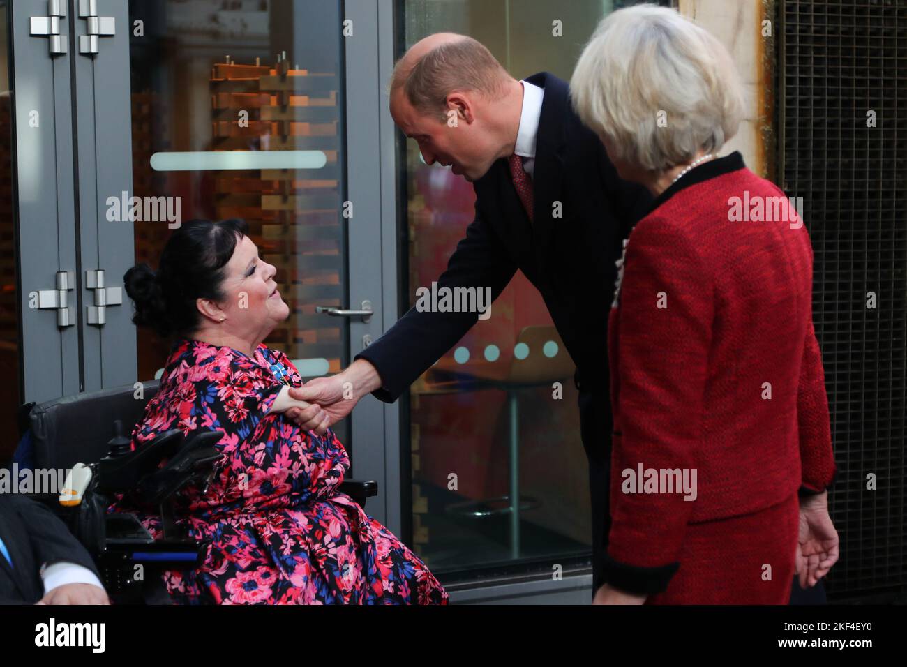 The Prince of Wales greets Rosaleen Moriarty Simmonds during a visit to ...