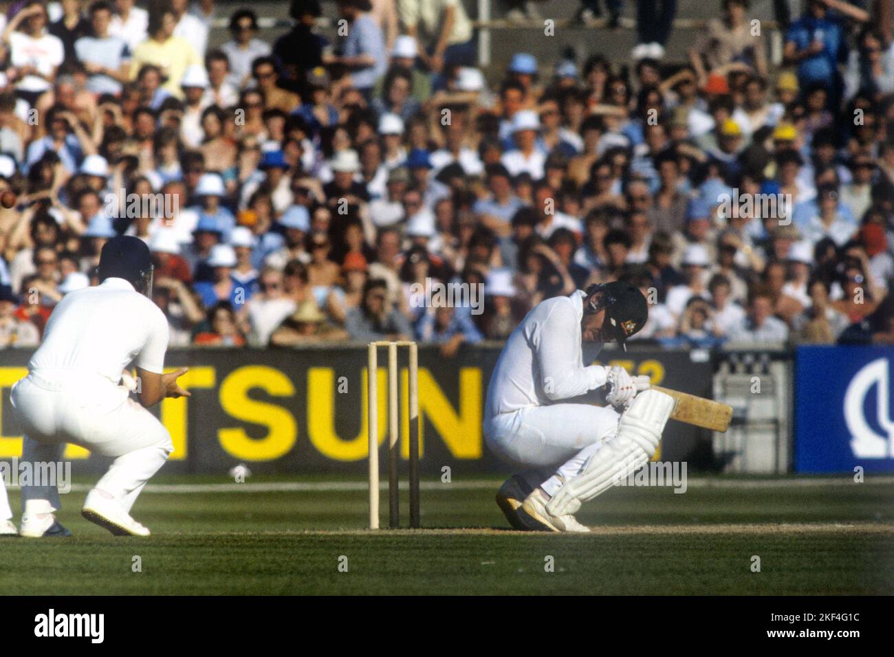 Alan Border, Australia, ducks from a Bob Willis (not pictured) bouncer ...