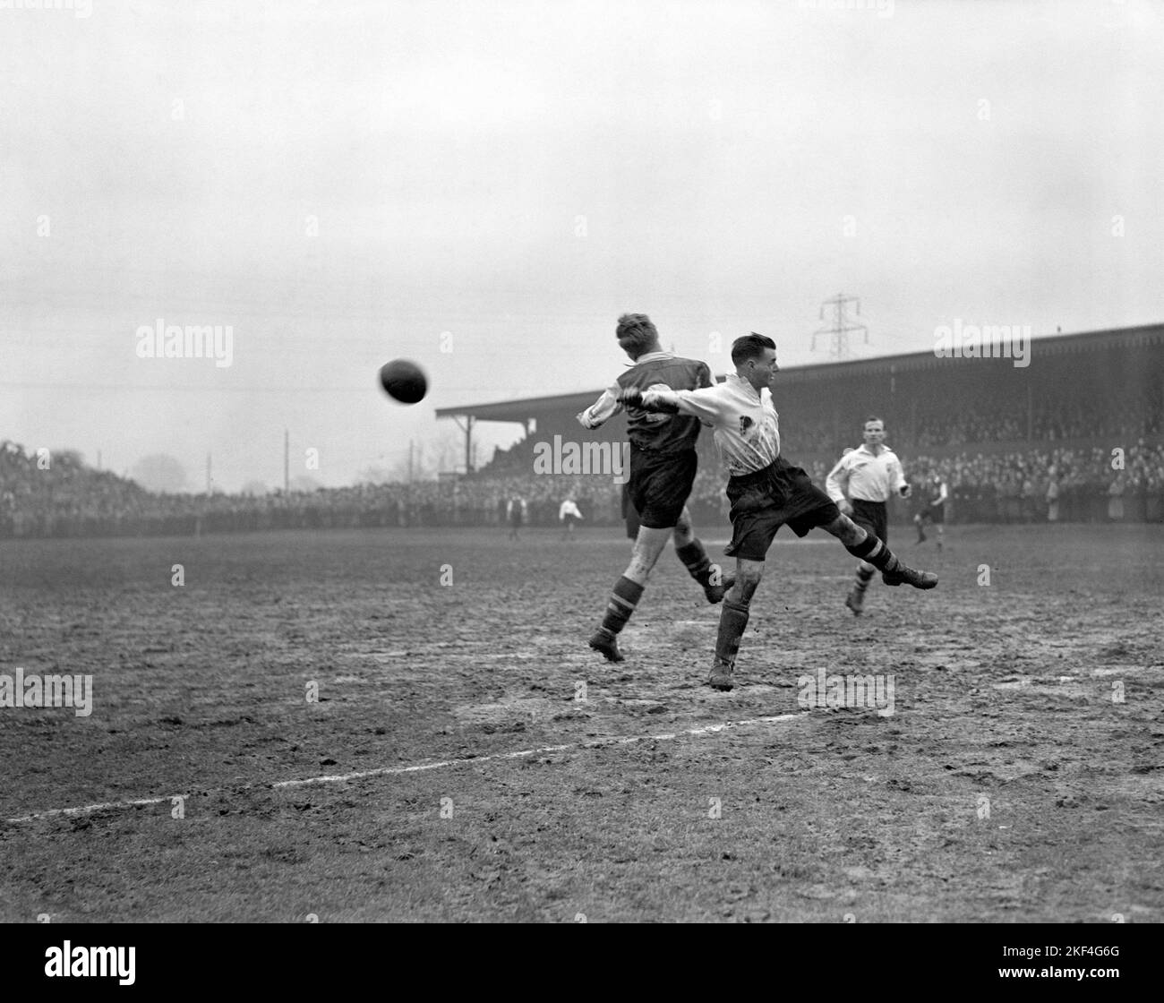 Harry Stannard, left, Wimbledon, and Les Walters, Tootings centre-half ...