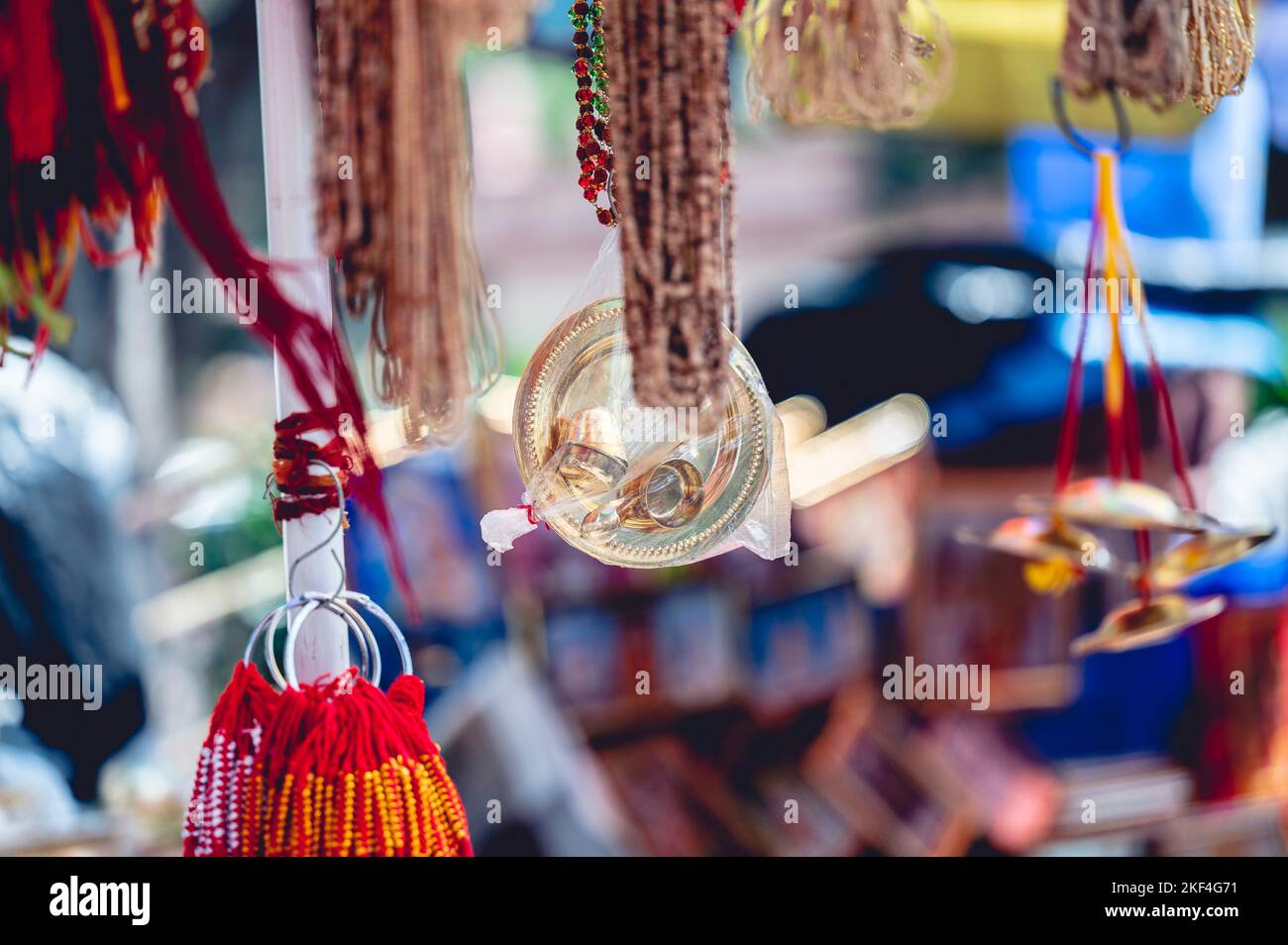 A close-up of gold Hindu jewelry at Hindu temple market in India Stock ...