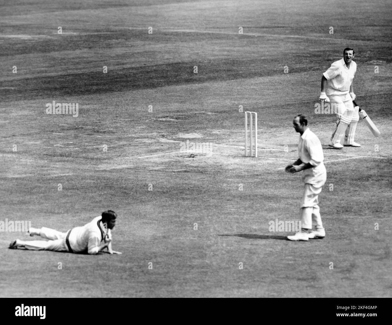 Jim Parks plays a ball from Bob Herman and is caught by Peter Parfitt ...