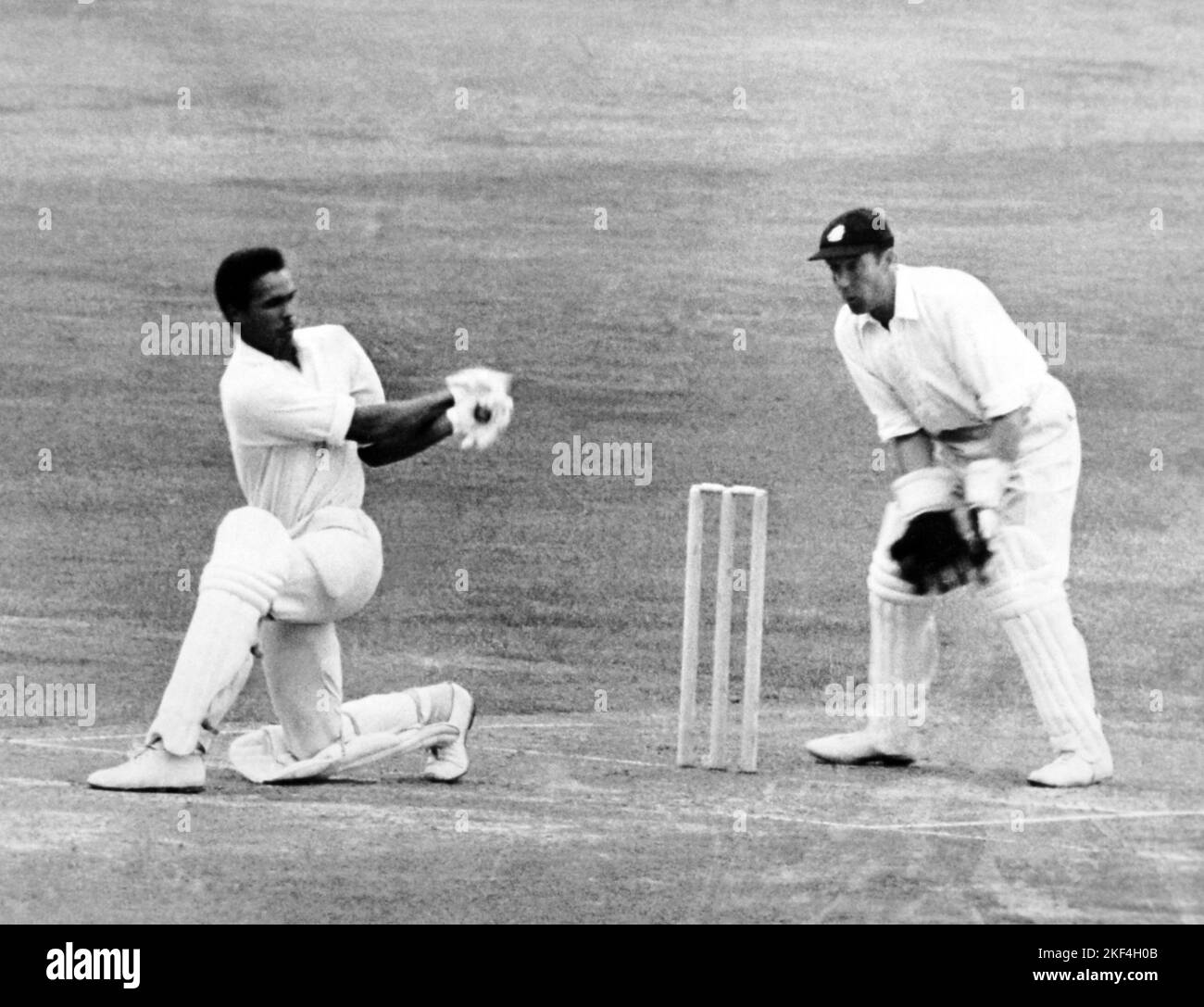 Keith Boyce (Essex) drives Peter Parfitt to the boundary Stock Photo ...