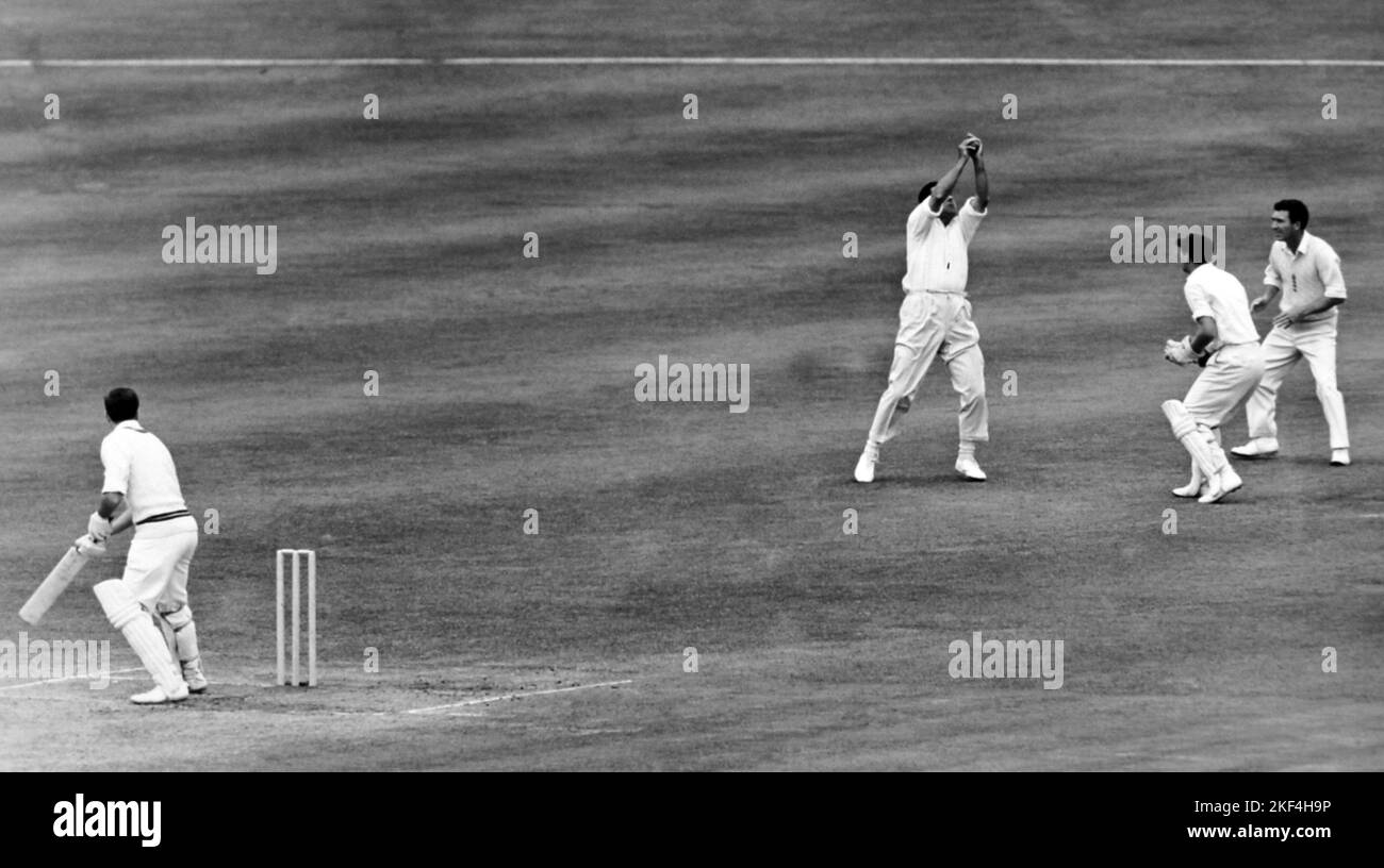 Richard Dumbrill (South Africa) is caught by Colin Cowdrey Stock Photo ...