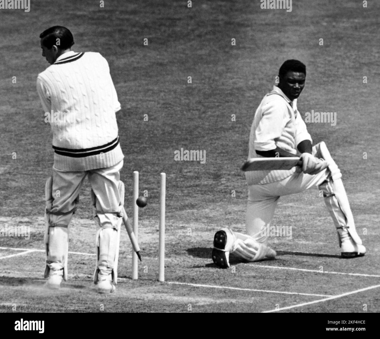 Carl Forbes (Nottingham) is clean bowled by Basil D'Oliviera (Worcester ...