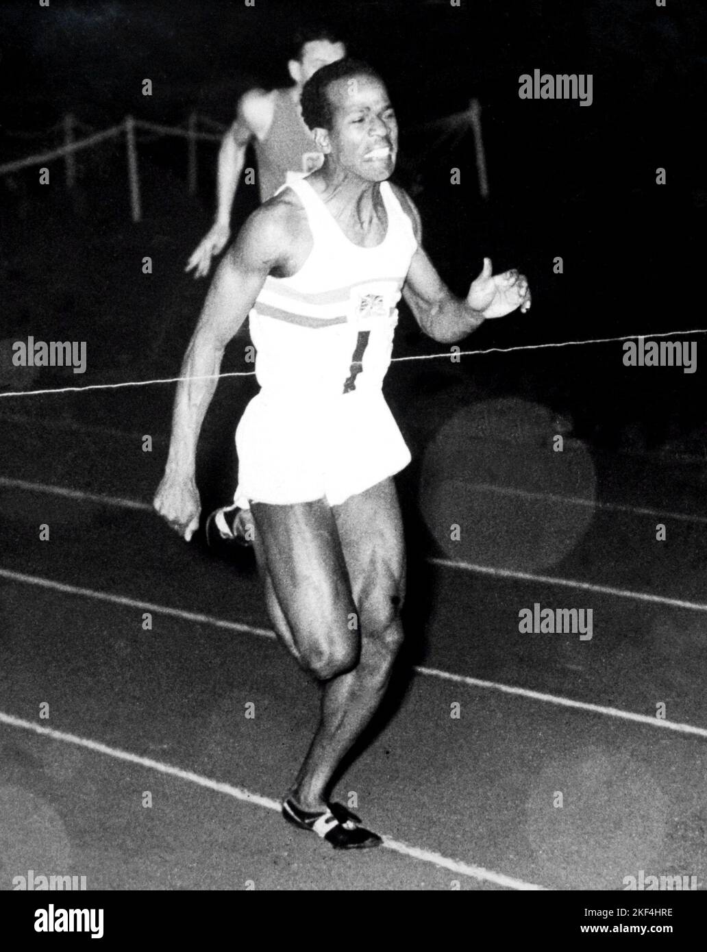 McDonald Bailey winning the 100 Metres Final at White City Stock Photo ...