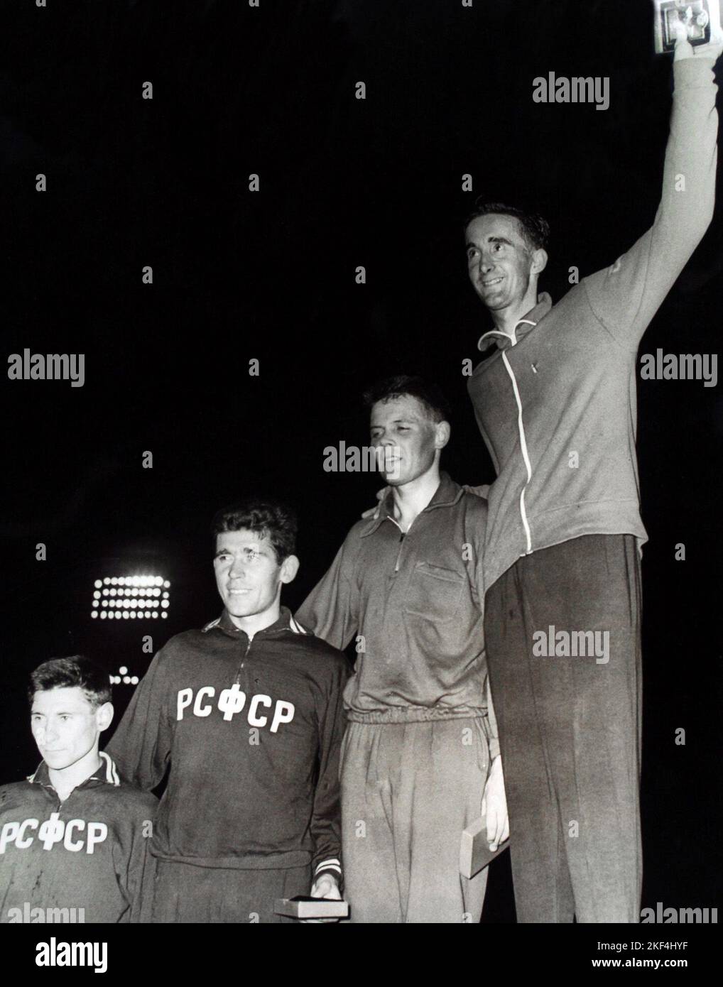 Great Britain's Gordon Pirie, right, on the winners rostrum Stock Photo ...
