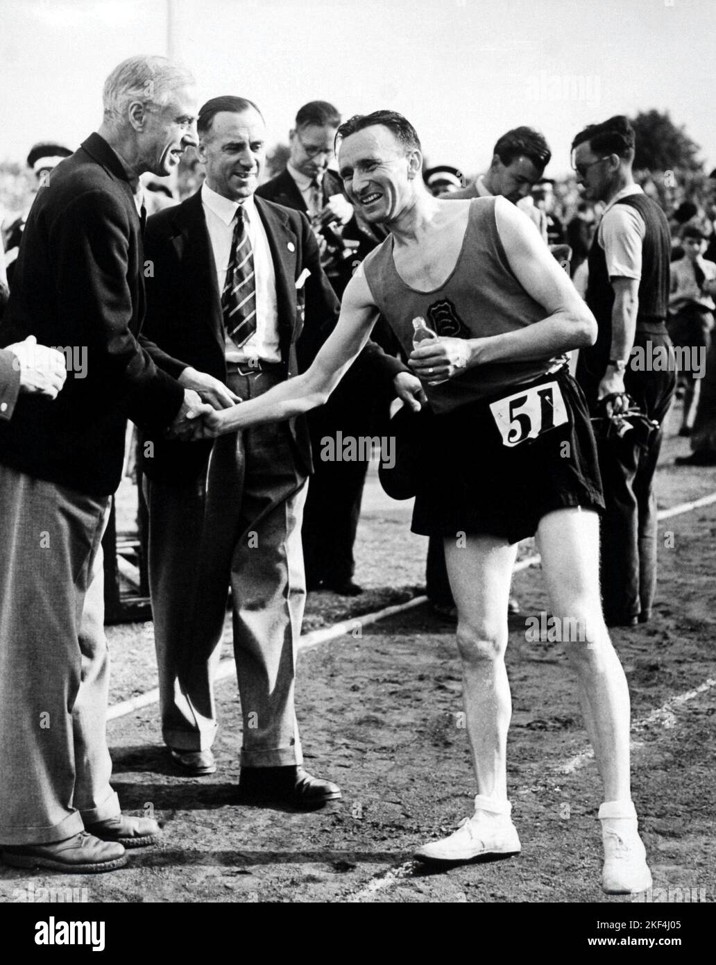 Jim Peters after winning the marathon event at the Polytechnic stadium ...