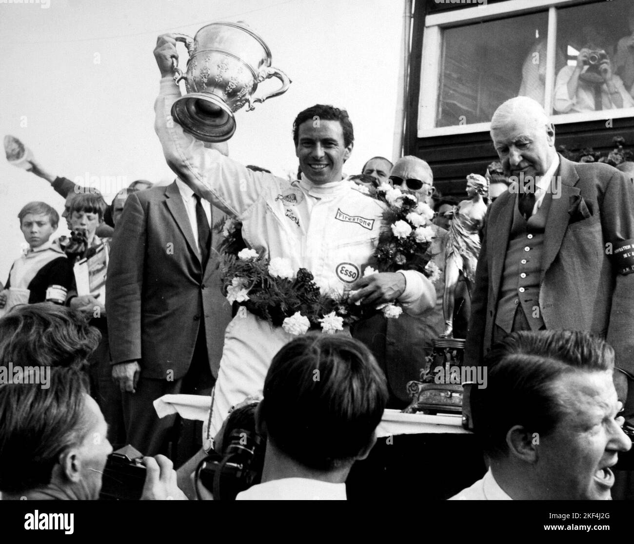 Jim Clark (GB) with the Mervyn O'Gorman Trophy after winning the ...