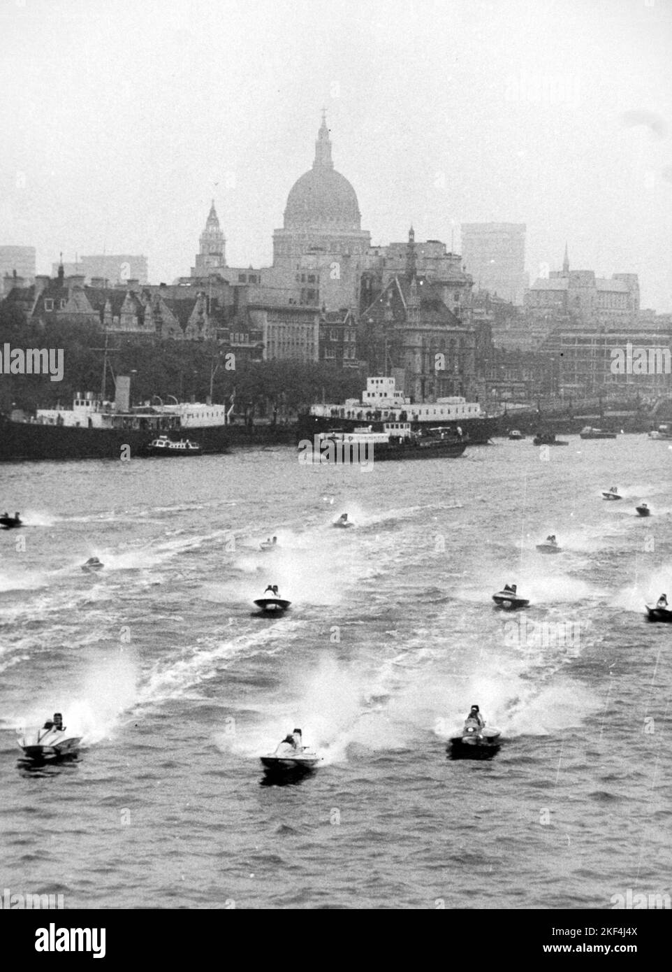 A general view of the race in progress as it approaches Waterloo Bridge ...
