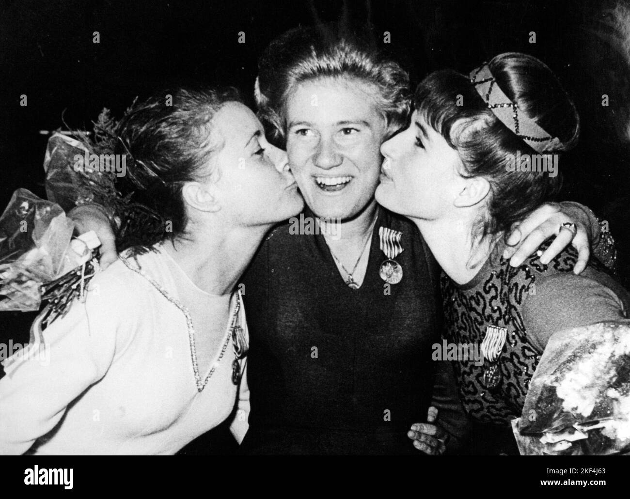Kisses for the champion Sjoukje Dijkstra, of Holland, from Nicole ...