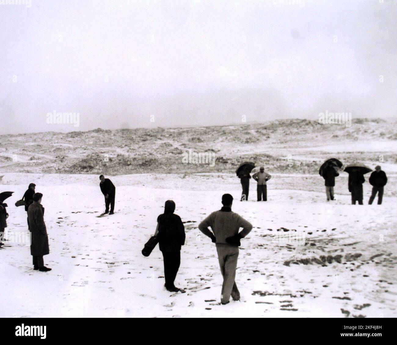 Peter Gracey playing in the snow at Rye Stock Photo - Alamy