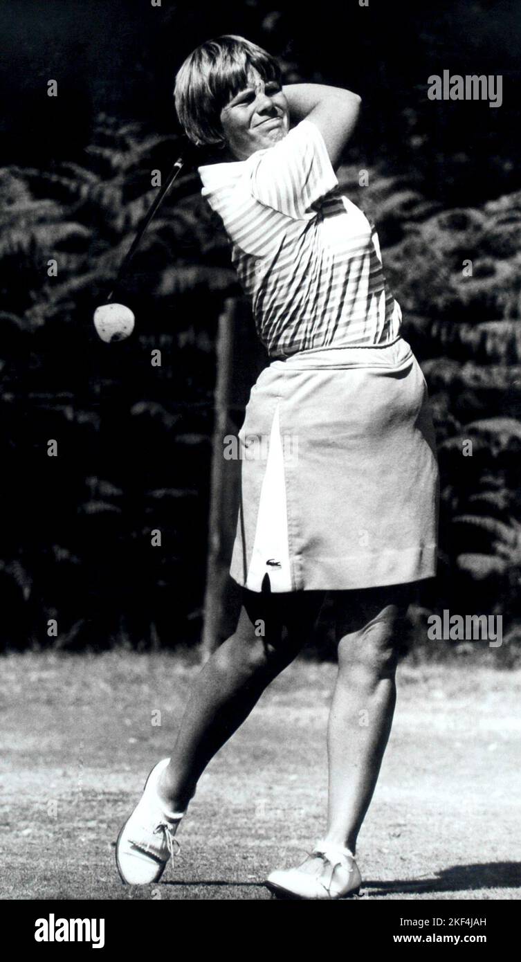 American Debbie Austin shows a determined face as she drives off the ...