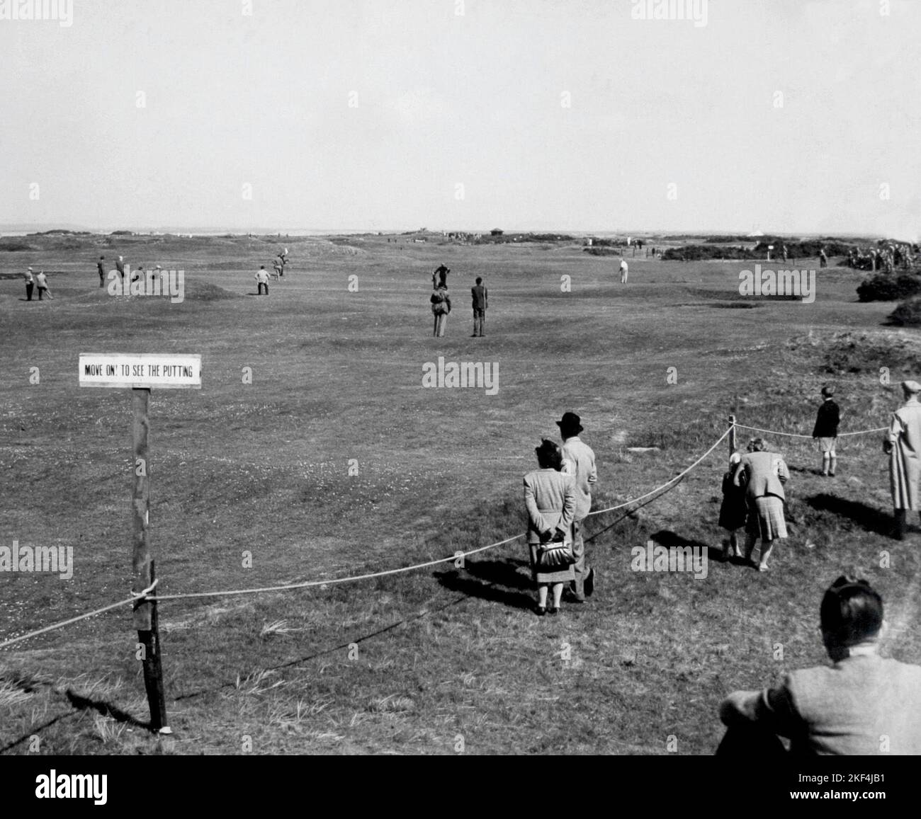 Cecil Ewing (GB) putting with Willie Turnesa (US) on the 4th green ...