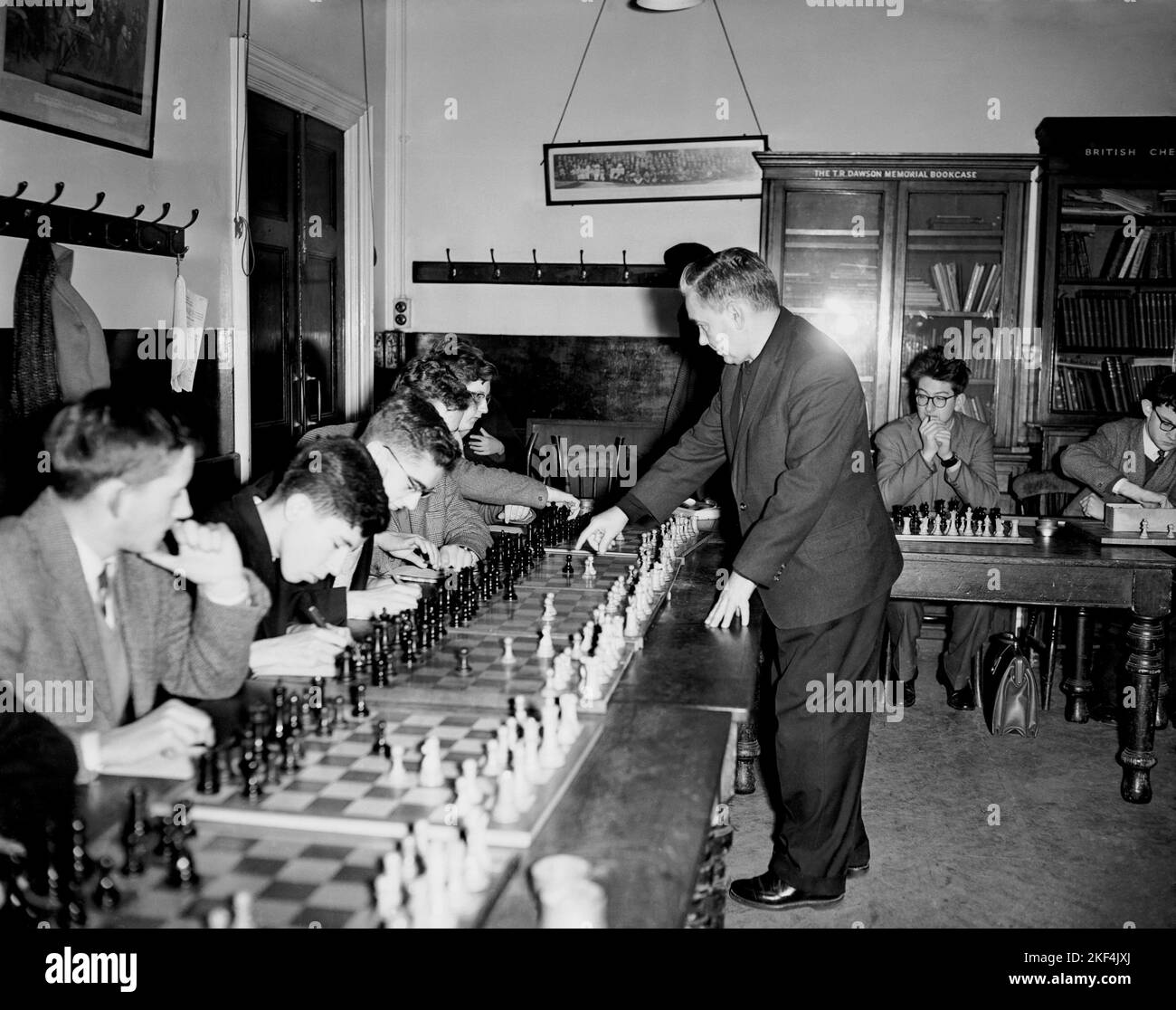 The USSR chess Grand Master Alexander Kotov, making a move in his match ...