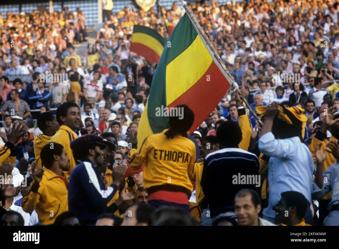 The Ethiopian athletes and the crowd celebrate as Miruts Yifter wins ...