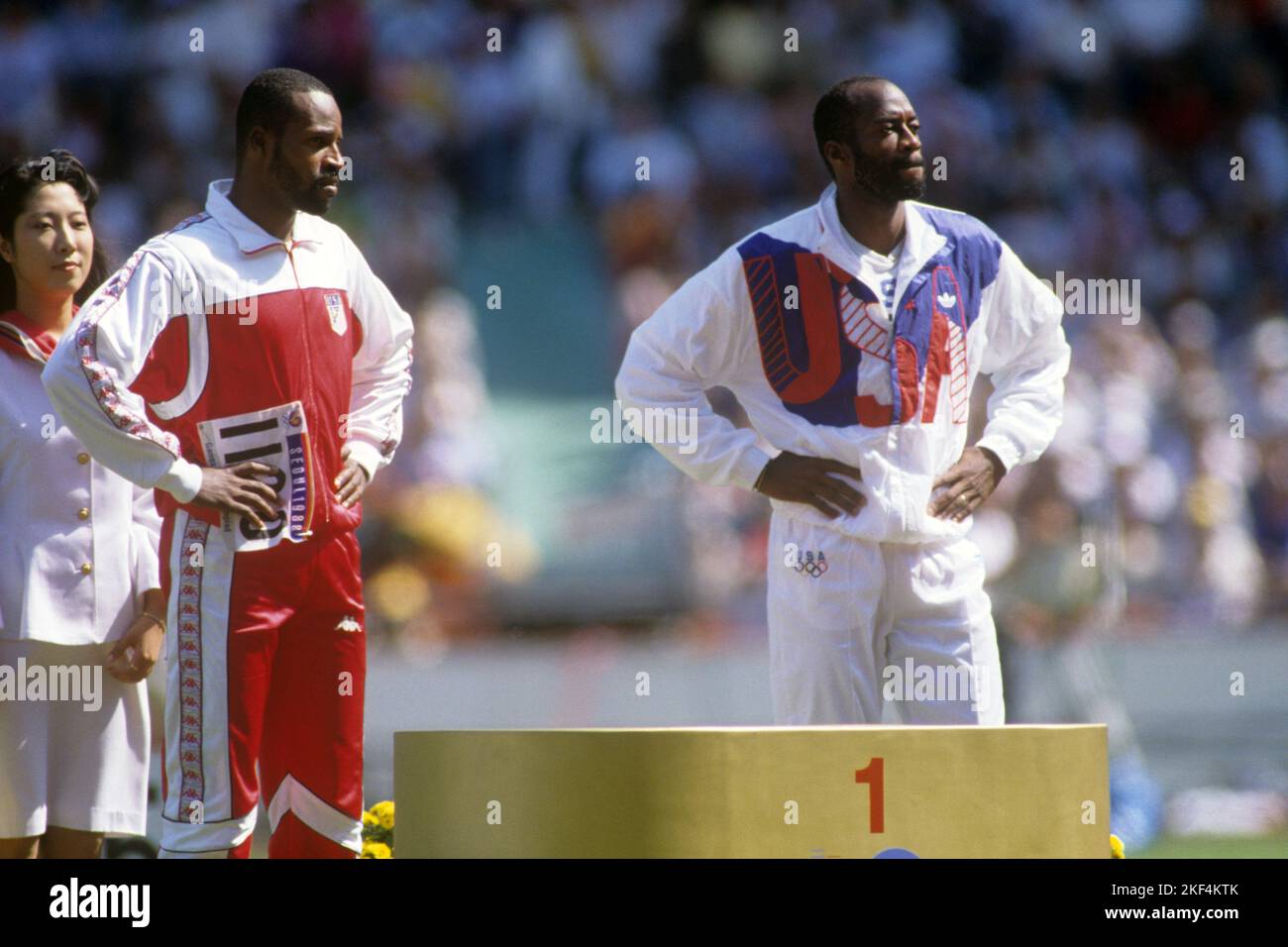 Gold medal winner Andre Phillips (l) and bronze medal winner Edwin ...